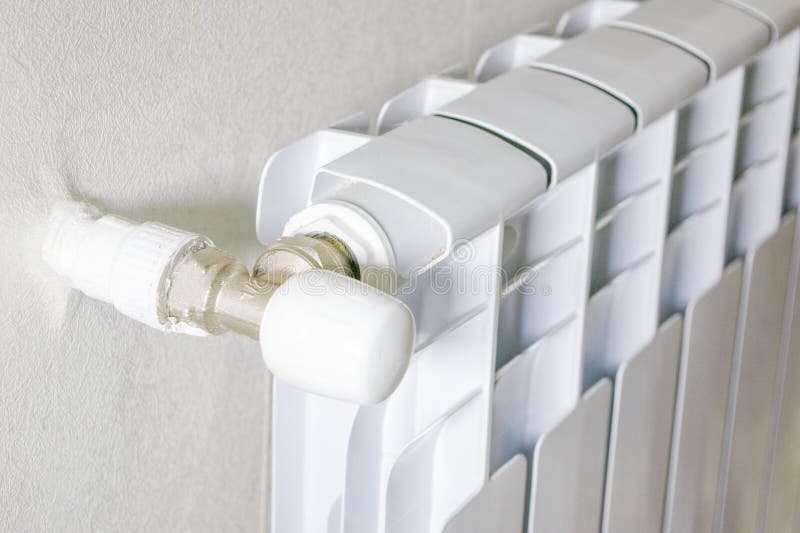 White Heating Battery in a Flat Stock Image - Image of battery, hand ...