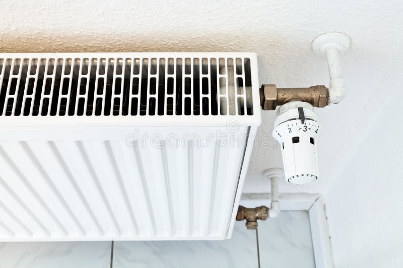 White home heat radiator stock photo. Image of building - 34768832
