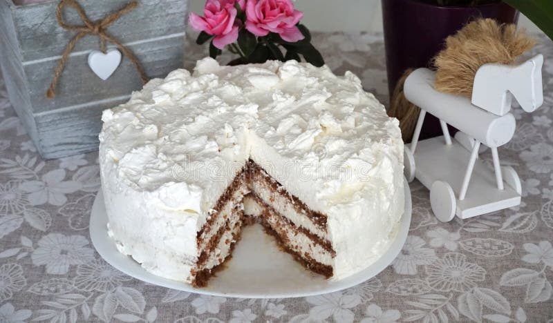 White Homemade Cake Decorated with with Lots of Whipped Cream on the ...