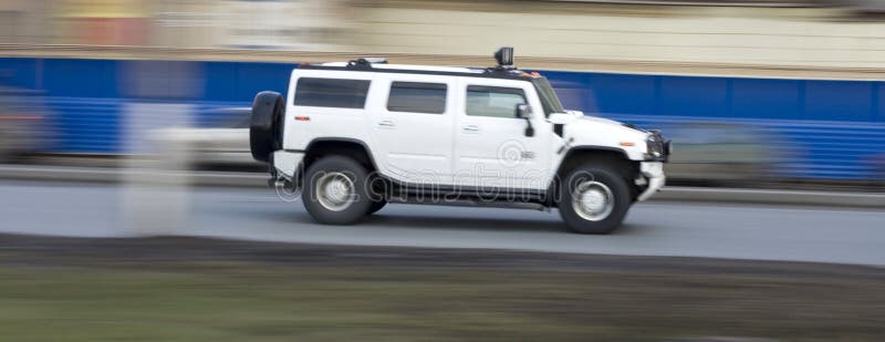 White Huge Hummer Suv Car Driving Fast, Rushing Forward Stock Image ...