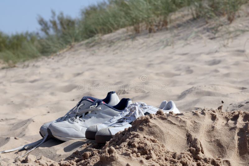 .white Human Shoes in the Beach Sand Stock Illustration - Illustration ...