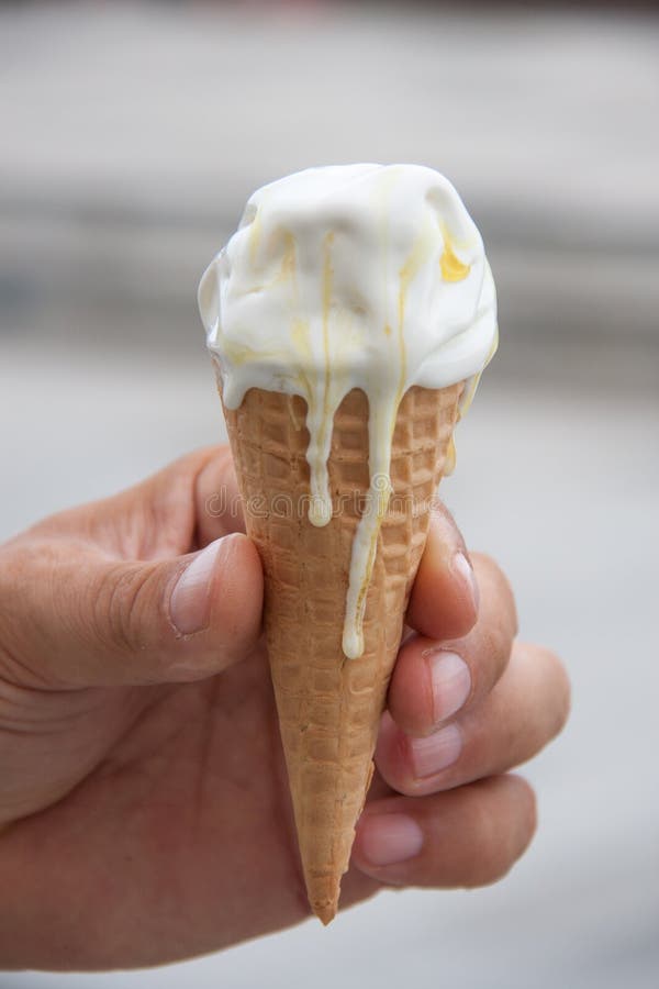 White Ice Cream Cone with Wafer in the Hand Stock Photo - Image of ...