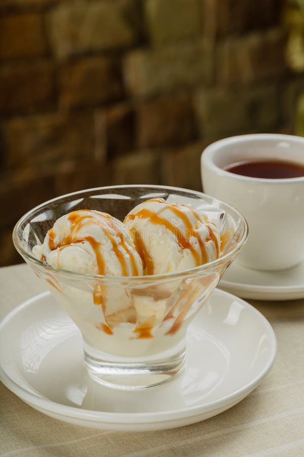 White Ice Cream in a Glass Glass with Caramel. Stock Image - Image of ...