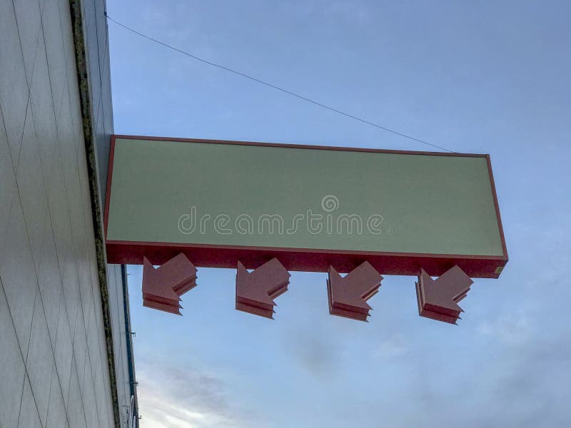 White Illuminated Sign with Red Indicator Arrows Stock Photo - Image of ...