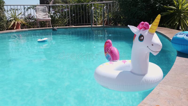 Inflatable Circle in the Form of a Unicorn in the Pool Stock Video ...