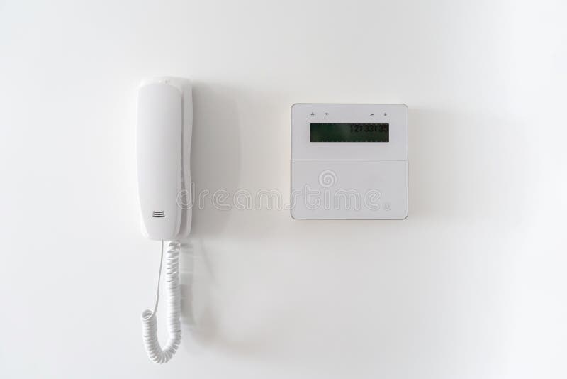 White Intercom and Digital Display on Wall Stock Image - Image of ...