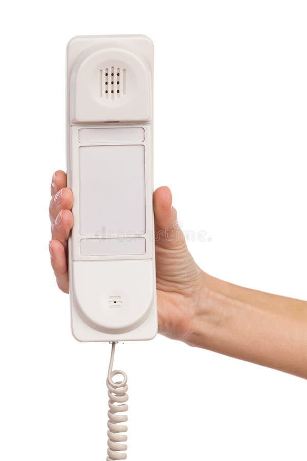 Intercom Handset in a Man`s Hand Against the Background of a White Wall ...