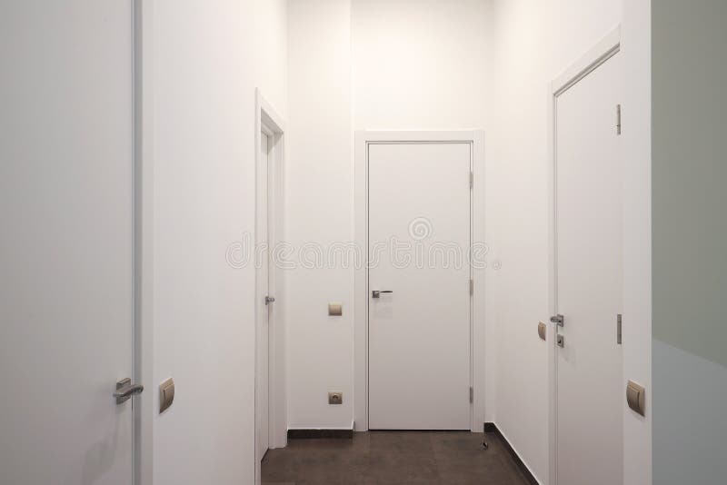 White Interior Doors in the White Corridor Stock Photo - Image of ...