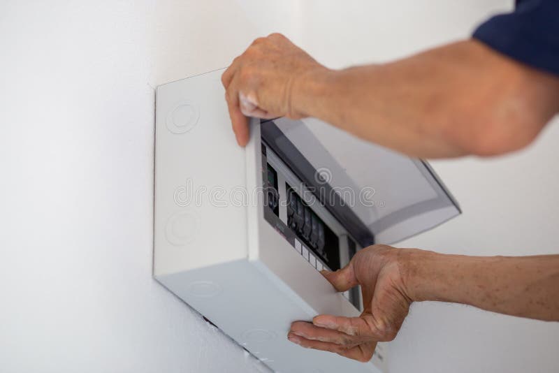 The White Iron Box is Mounted on the Wall and the Wires are Embedded ...