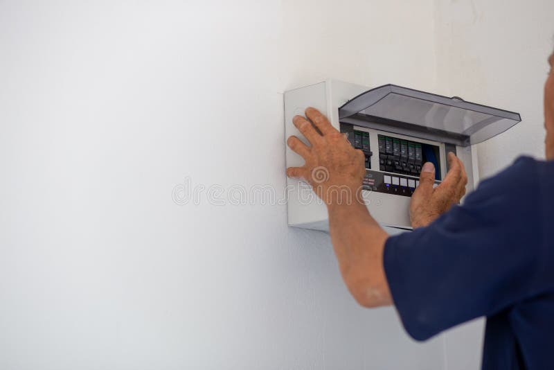 The White Iron Box is Mounted on the Wall and the Wires are Embedded ...