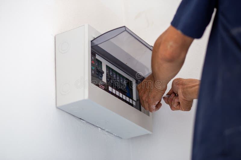 The White Iron Box is Mounted on the Wall and the Wires are Embedded ...