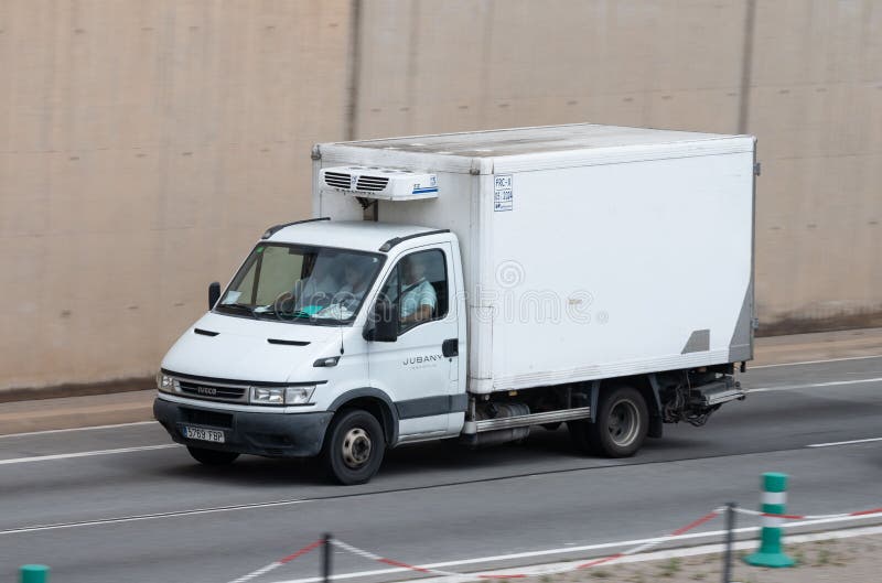 White Iveco daily Truck on Road Editorial Photography - Image of city ...