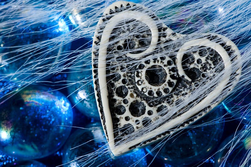 White Ivory Heart Shape on Blue Crystals Stock Photo - Image of amour ...