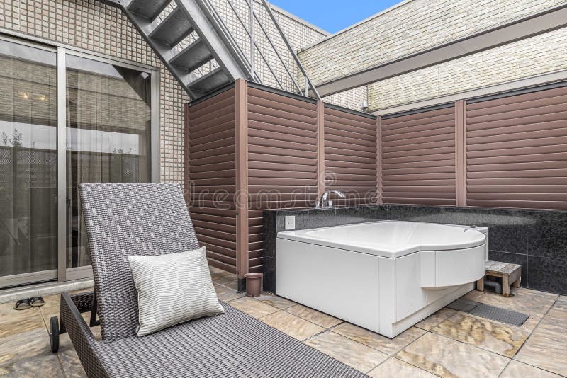 White White Jacuzzi Installed Outside the Balcony Stock Photo - Image ...