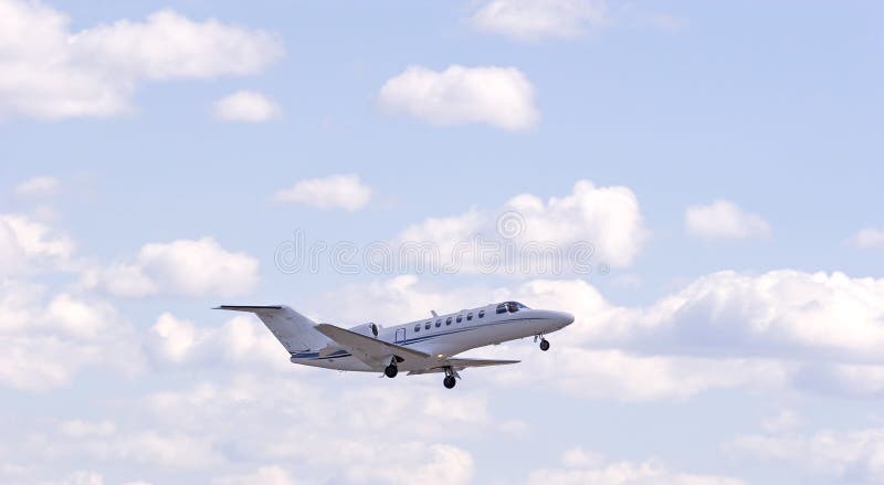 White Jet in Clouds stock photo. Image of takeoff, departure - 4751064