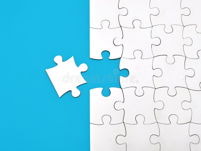 White Jigsaw Puzzle on Blue Background, Top Angle View Stock Image ...