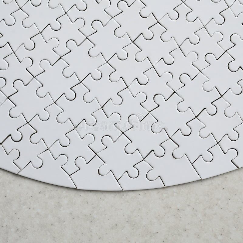 A White Jigsaw Puzzle in the Complete Form Lies on a Treated Stone ...