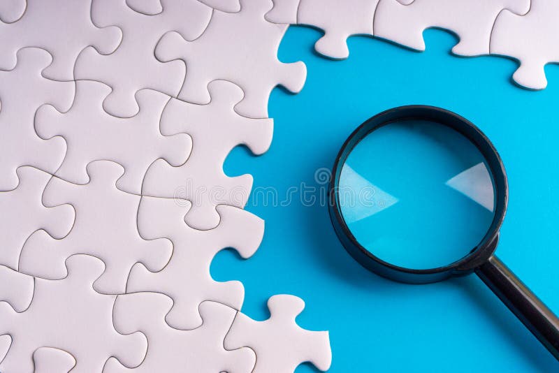 Puzzle and magnifier stock photo. Image of shape, strategies - 1461962