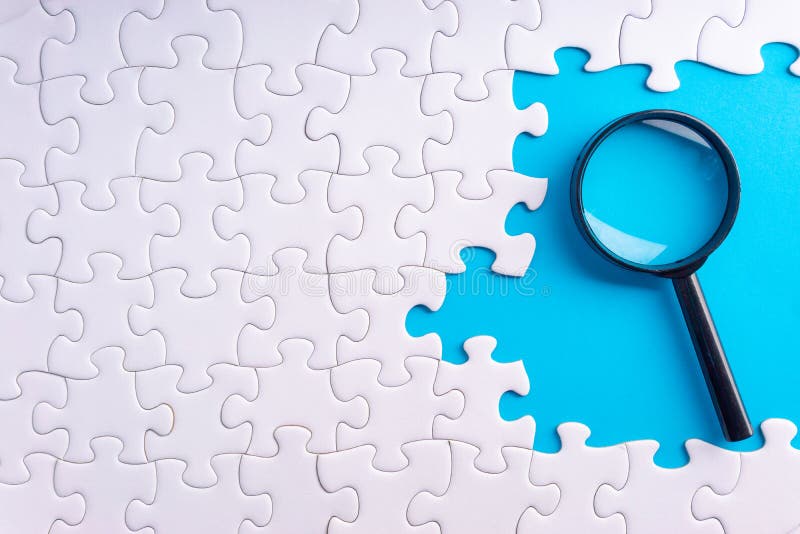 Puzzle and magnifier stock photo. Image of shape, strategies - 1461962