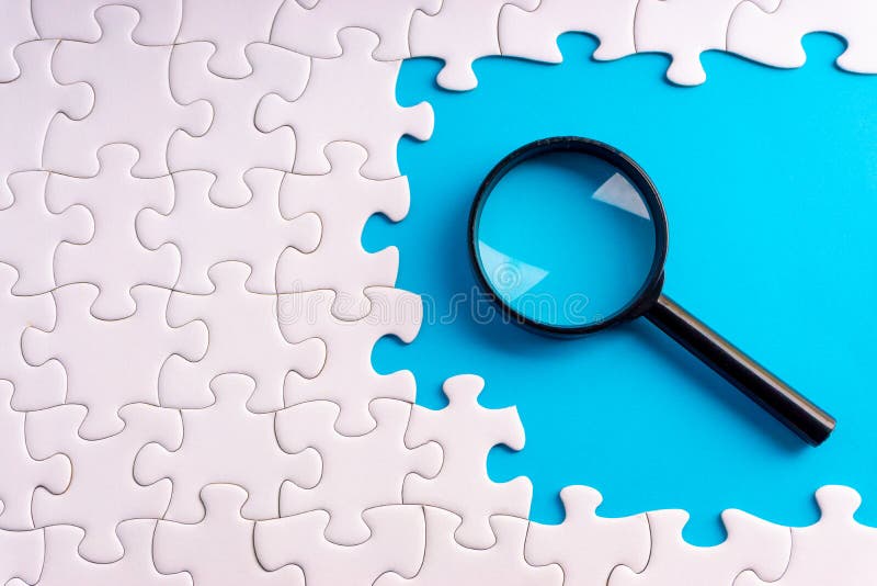 Puzzle and magnifier stock photo. Image of shape, strategies - 1461962