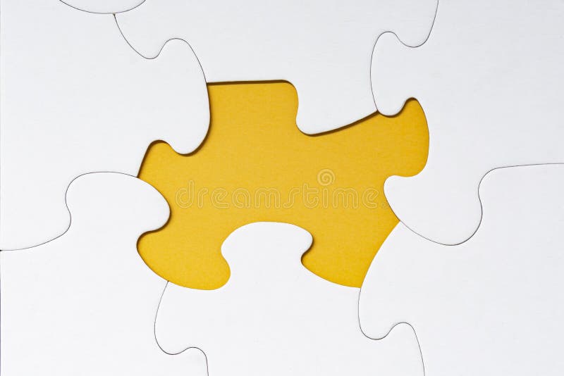 White Jigsaw Puzzle with Some Missing Pieces on Yellow Background ...
