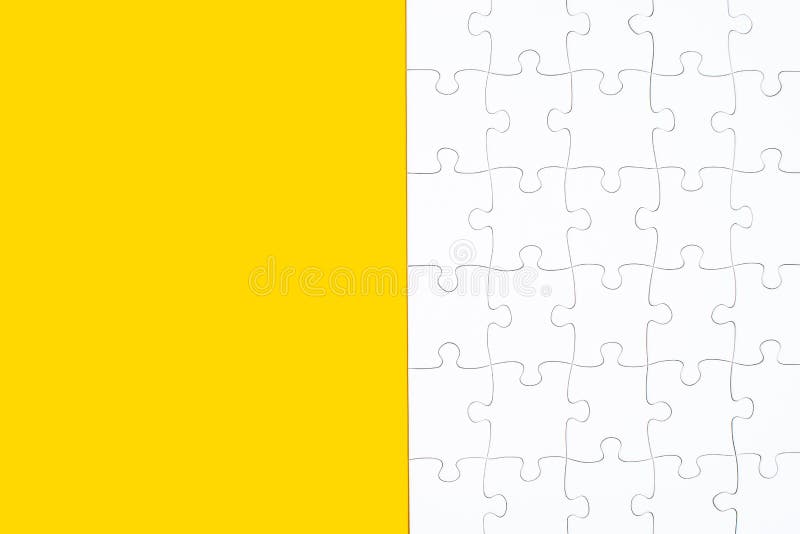 White Jigsaw Puzzle on Yellow Background with Copy Space Stock ...