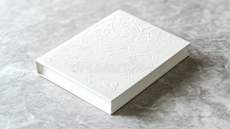 A White Journal with a Simple Embossed Design Resting on a Bright Stock ...