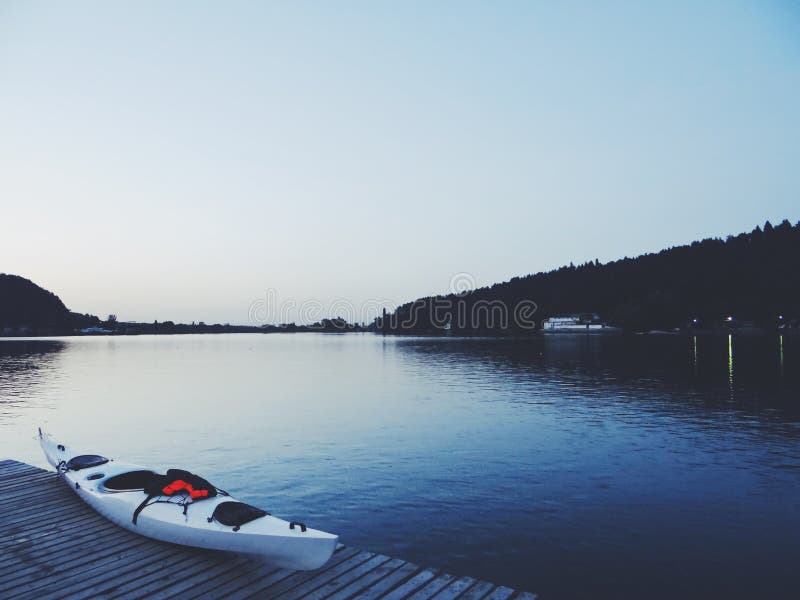 White Kayak On Brown Wooden Dock Picture. Image: 113417000