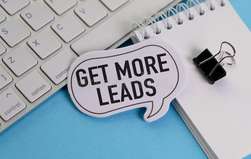 A White Keyboard with a Clip on it and a White Notebook with the Words ...