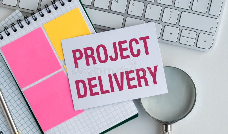 A White Keyboard with a Pink and Yellow Sticky Note that Says Project ...