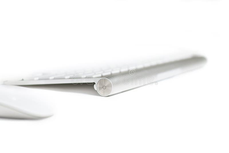 White Keyboard on Table Showing Power Button Stock Photo - Image of ...