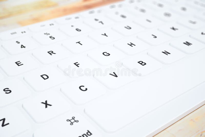 White Keyboard on Wooden Table Editorial Photography - Illustration of ...