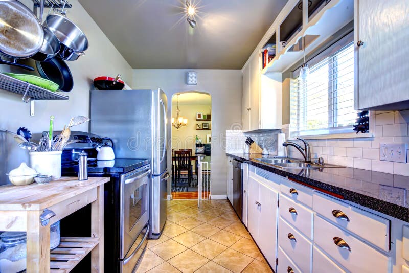White Kitchen with Grey Walls and Pots and Pens. Stock Image - Image of ...