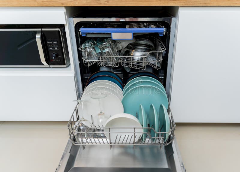The White Kitchen and Opened Dishwasher with Clean Dishes Stock Image ...