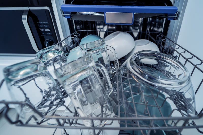 The White Kitchen and Opened Dishwasher with Clean Dishes Stock Image ...