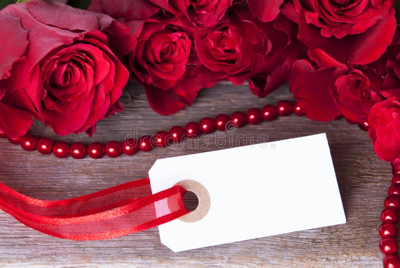 White Label with Red Roses stock photo. Image of concept - 36697964