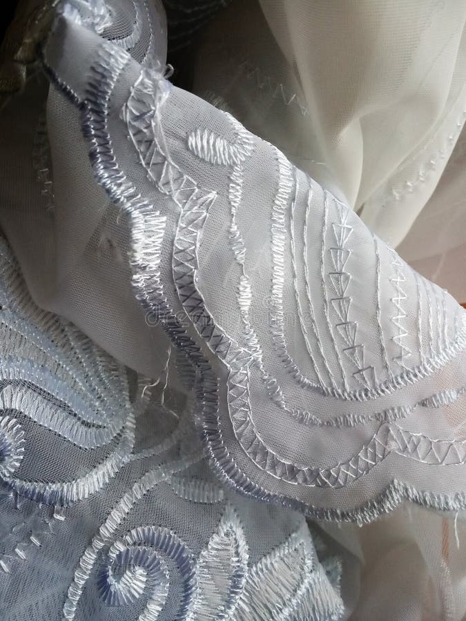 White Lace Thread Embroidery on White Transparent Fabric Stock Image ...