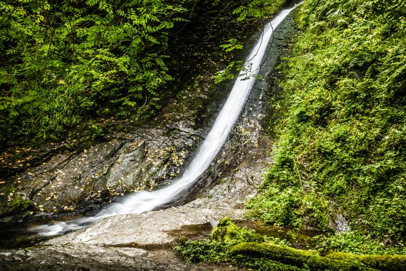 Lady at a Waterfall stock image. Image of interior, aqua - 223644735
