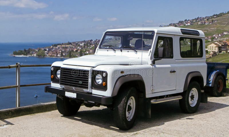 White Land Rover Defender on Holiday Stock Photo - Image of rover ...