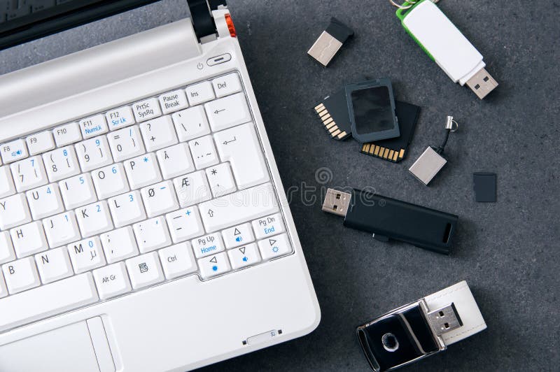 White Laptop with Data Storage Accessories Stock Image - Image of ...