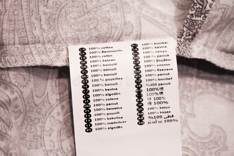 White Laundry Label Tag with Sign Cotton in 36 Languages on Bed Linen ...