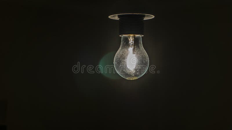 White Light Bulb on Black Background Stock Photo - Image of brand ...