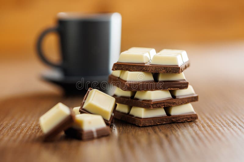 White Light Dark Chocolate Bars on Wooden Table Stock Photo - Image of ...