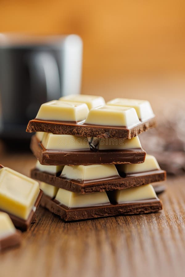 White Light Dark Chocolate Bars on Wooden Table Stock Image - Image of ...