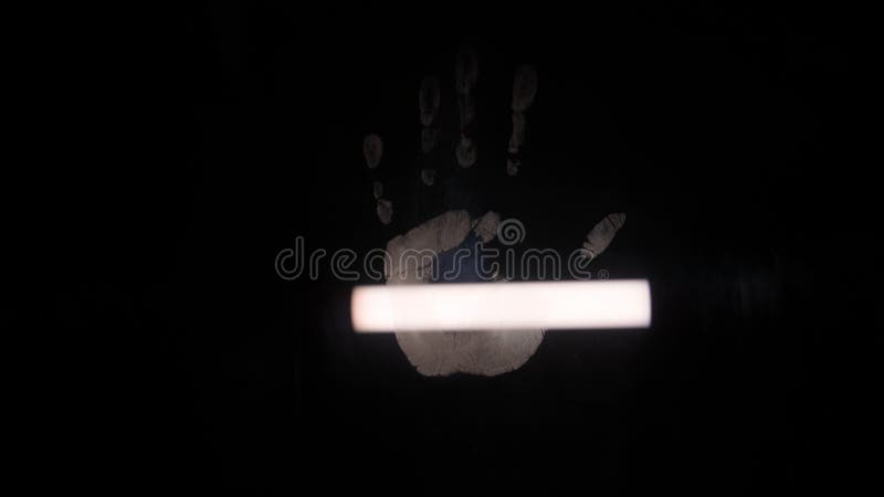 White Light Neon Access Scanner Scanning Human Hand Print on Glass ...