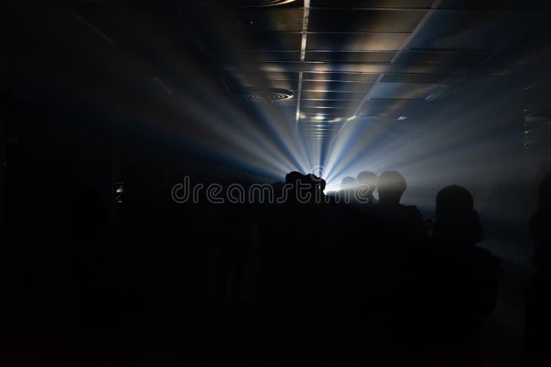White Light Ray in the Underground with Shadow of People Stock Image ...