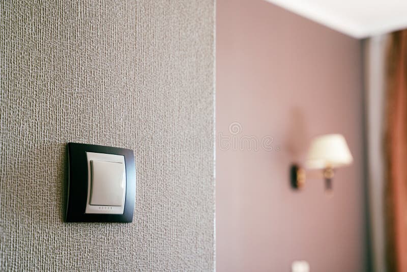 Switch and Socket on Brown Wall Stock Image - Image of line, cord ...