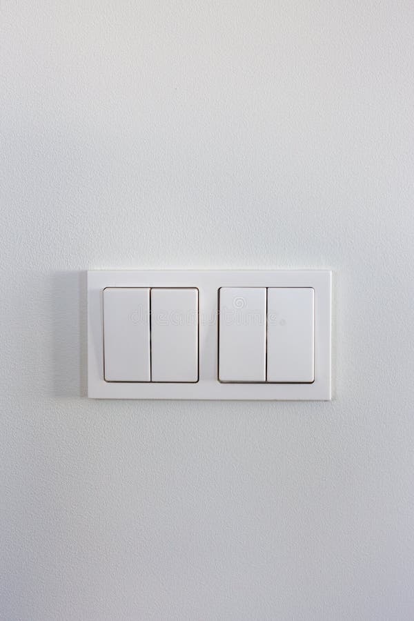 White Light Switches on a White Wall Stock Photo - Image of floor ...