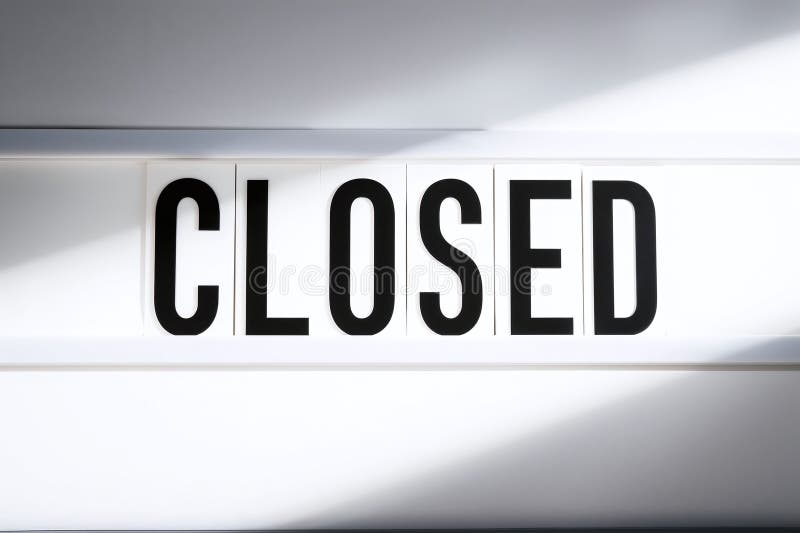 White Lightbox Displaying Bold Black Letters Spelling CLOSED with ...