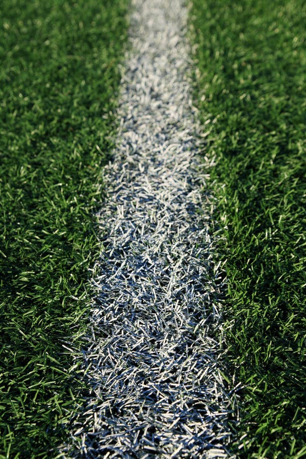 White Line on Artificial Turf Stock Image - Image of shallow, vertical ...